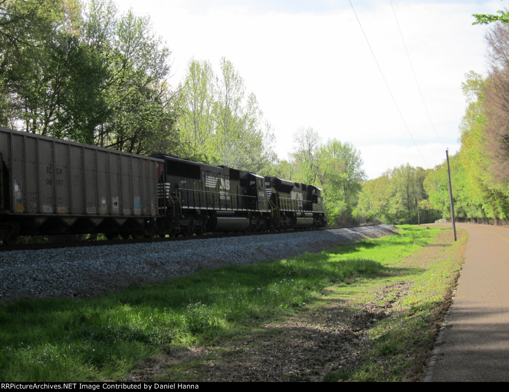 Two EMD's work as DPU's making this a All-EMD power coal train